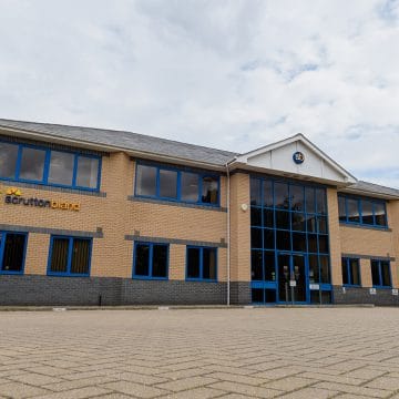 History of Scrutton Bland | Scrutton Bland